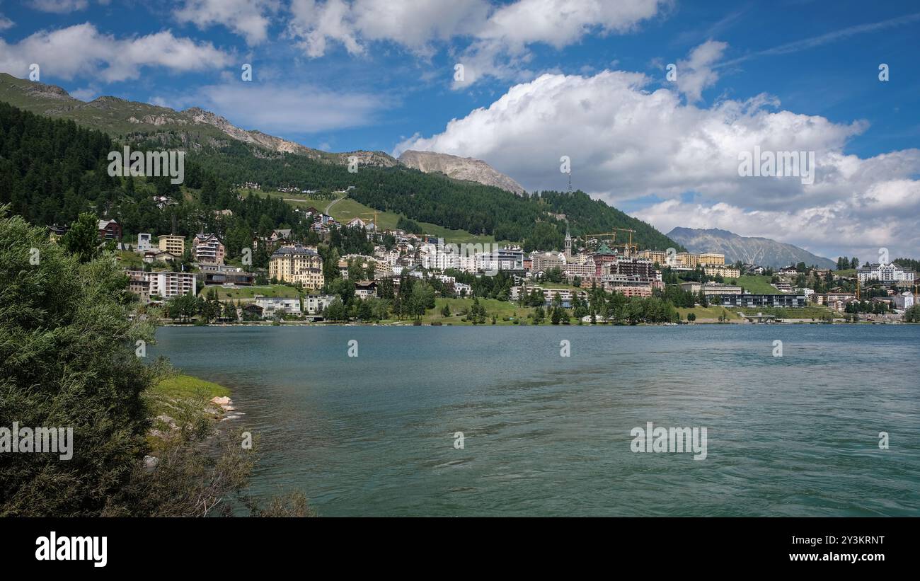 The mountain lake of St. Moritz with the fashionable alpine resort in ...