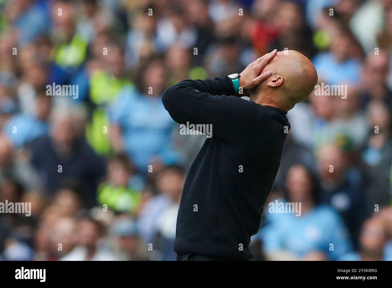 Manchester City's head coach Pep Guardiola reacts during the English ...