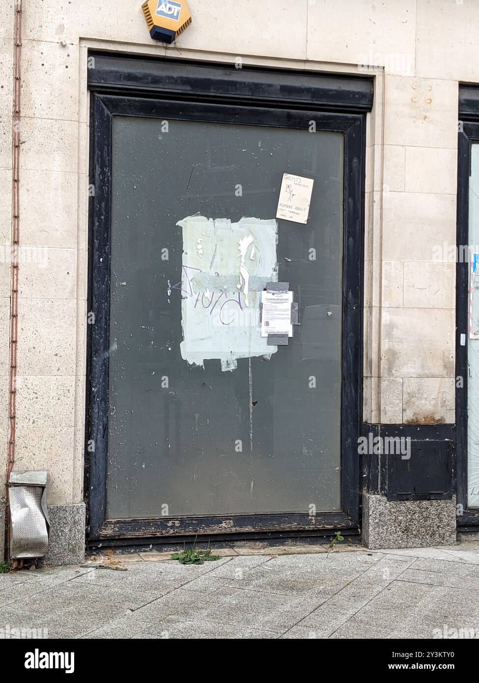 Shut Down Shop Boarded up in a Town Stock Photo - Alamy