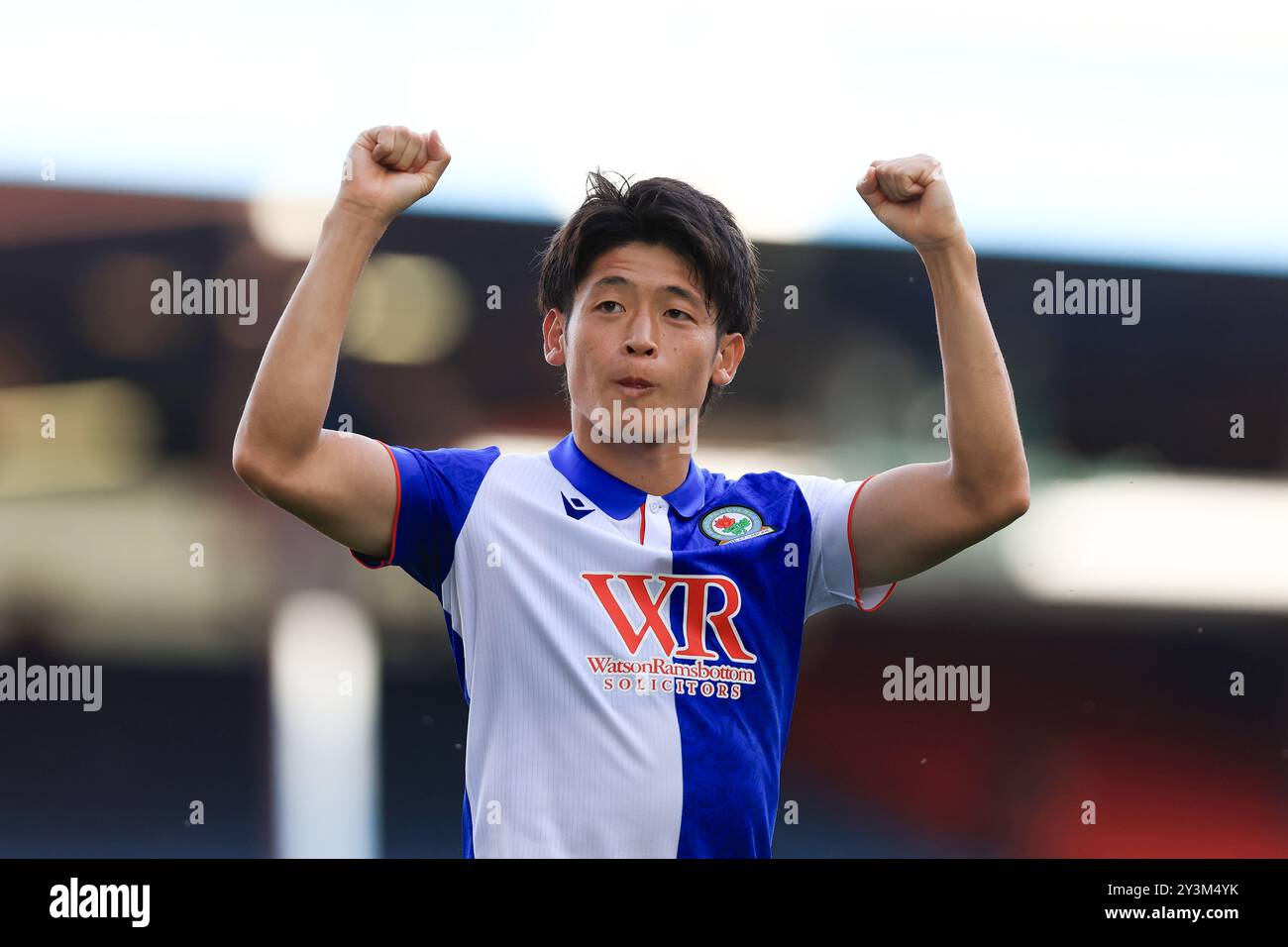 Blackburn Rovers' Yuki Ohashi celebrates victory towards the crowd ...
