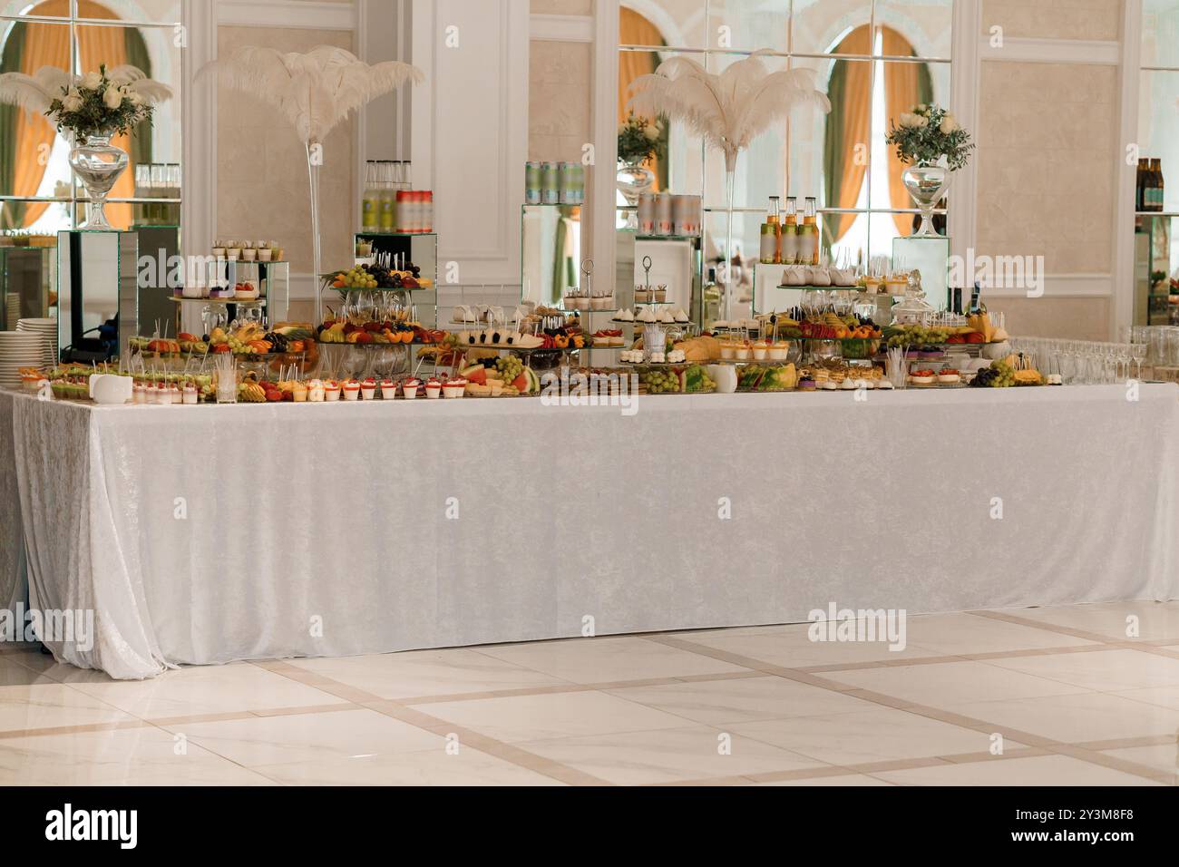 Elegant Luxury Banquet Table Setting with Exquisite Variety of Appetizers and Decor in a Lavish ...