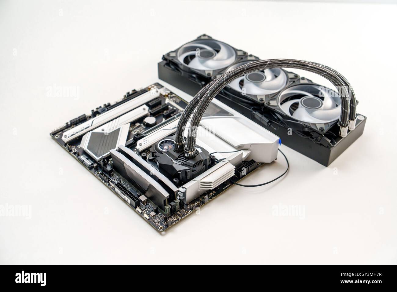 Elegant White Themed Gaming Motherboard Featuring Advanced CPU Liquid ... Elegant White Themed Gaming Motherboard Featuring Advanced CPU Liquid ...