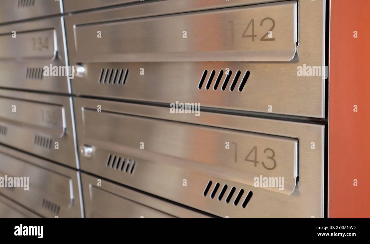 Mail post boxes in apartment hi-res stock photography and images - Alamy