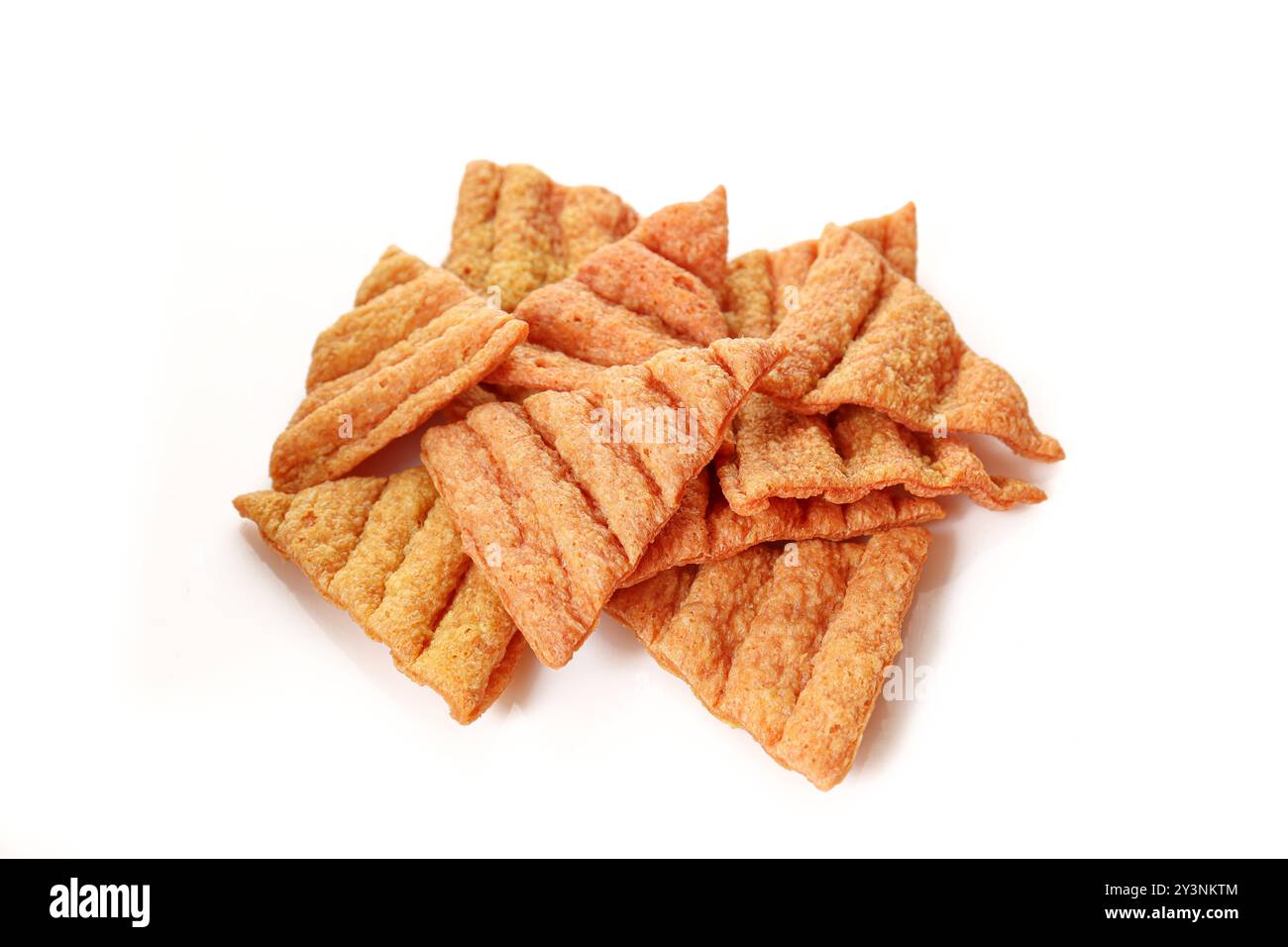 Stack of triangle shaped lentil chips snack isolated on white ...