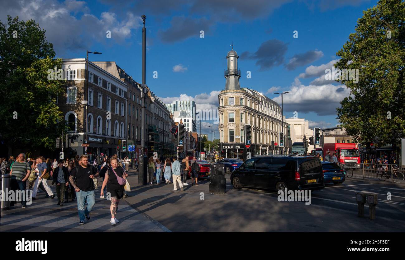Pedestrians crossing the road on the York Way junction by Kings Cross ...