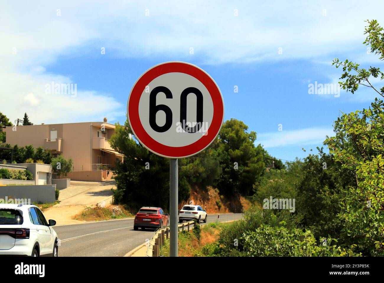 Traffic sign 60, Speed limit 60, on mountain road in Croatia, selective ...