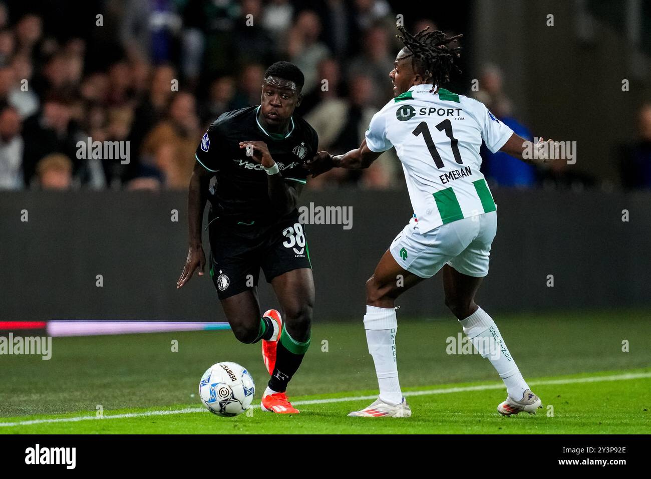 Ibrahim osman dribbles with the ball past noam emeran hi-res stock ...