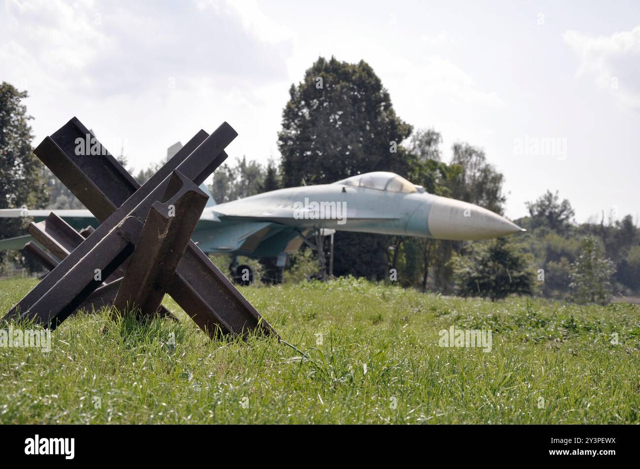 Anti-tank barriers made of railway rails at a military airfield Stock ...