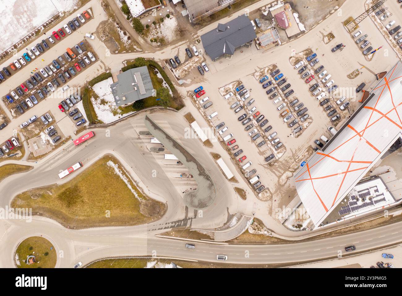 Aerial view of a small town featuring residential buildings, and a road ...