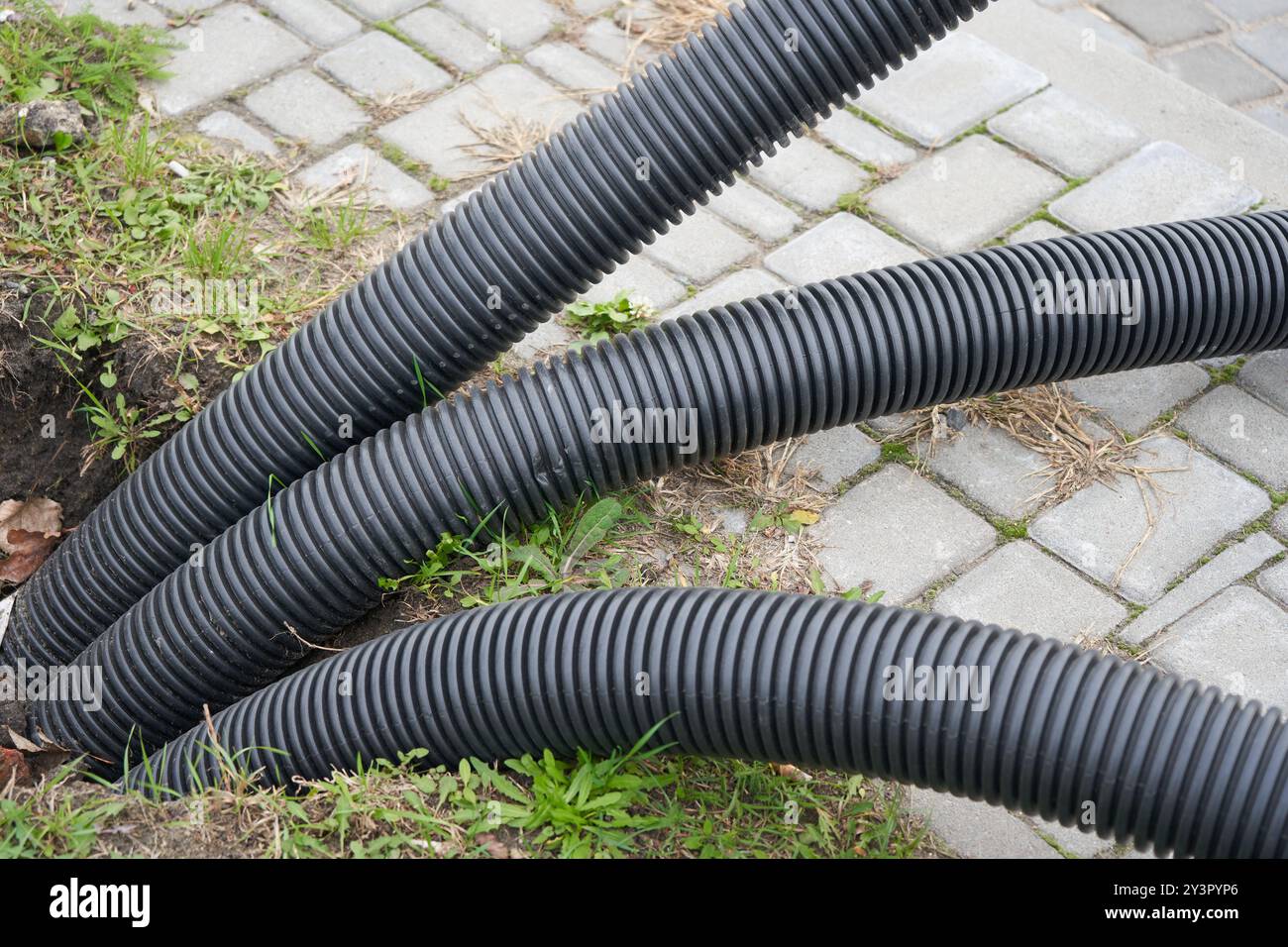 laying corrugated pipes in the ground, industrial pipelines work Stock ...