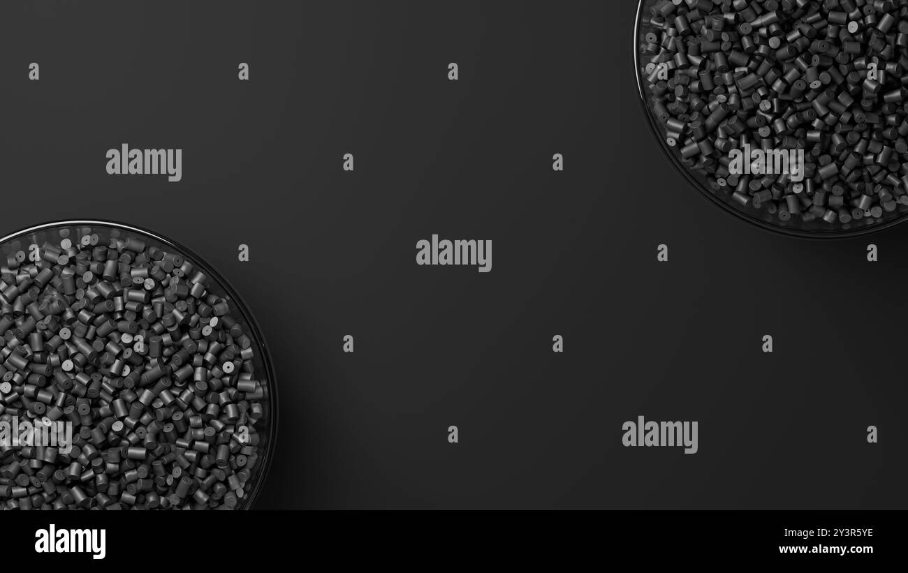 Top view on two glass cups with black plastic polypropylene granules ...