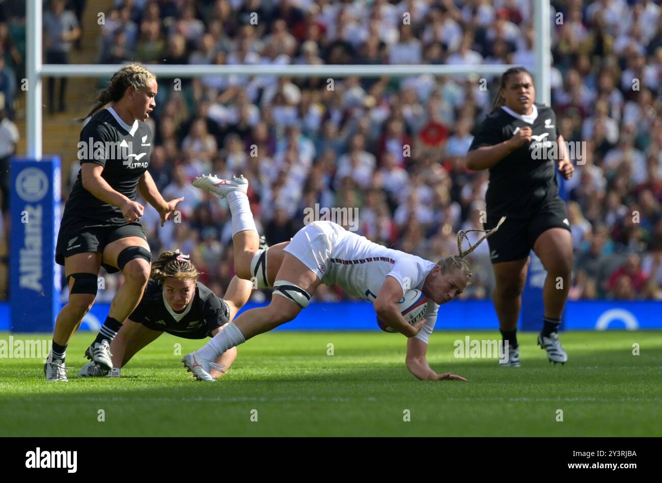LONDON, ENGLAND -14-9-2024 Alex Matthews of England is taken down ...