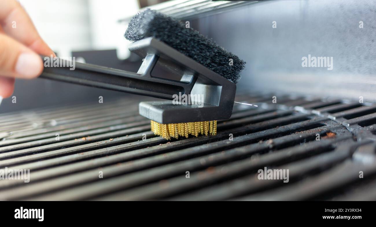 Person cleaning outdoor barbecue grill hi-res stock photography and ...