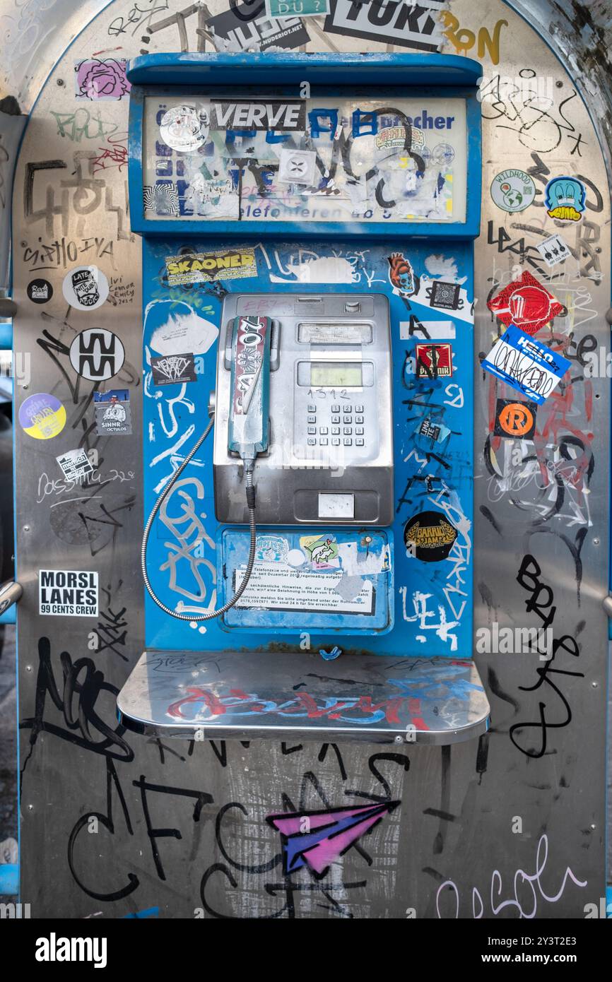 Public Phone Booth covered with stickers and graffitt in Berlin Germany ...