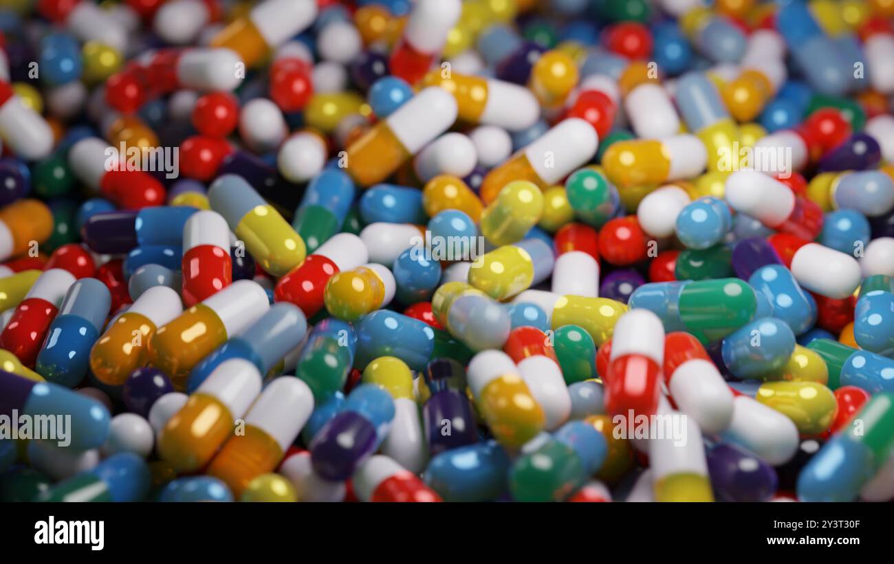 Pharmaceutical industry bunch of various colours white capsule pills on ...