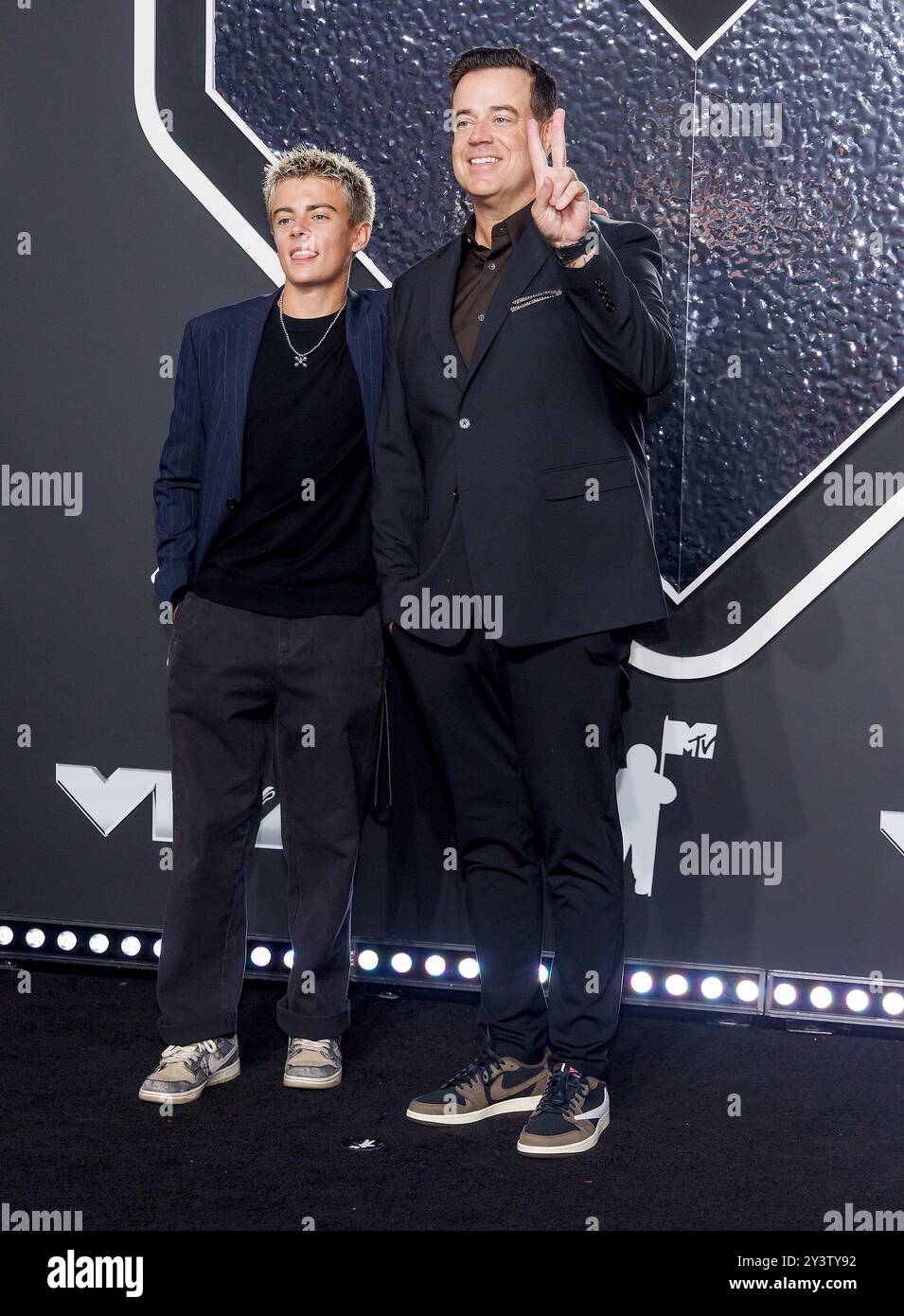 11 September 2024 - Elmont, New York - Carson Daly and son. 2024 MTV ...