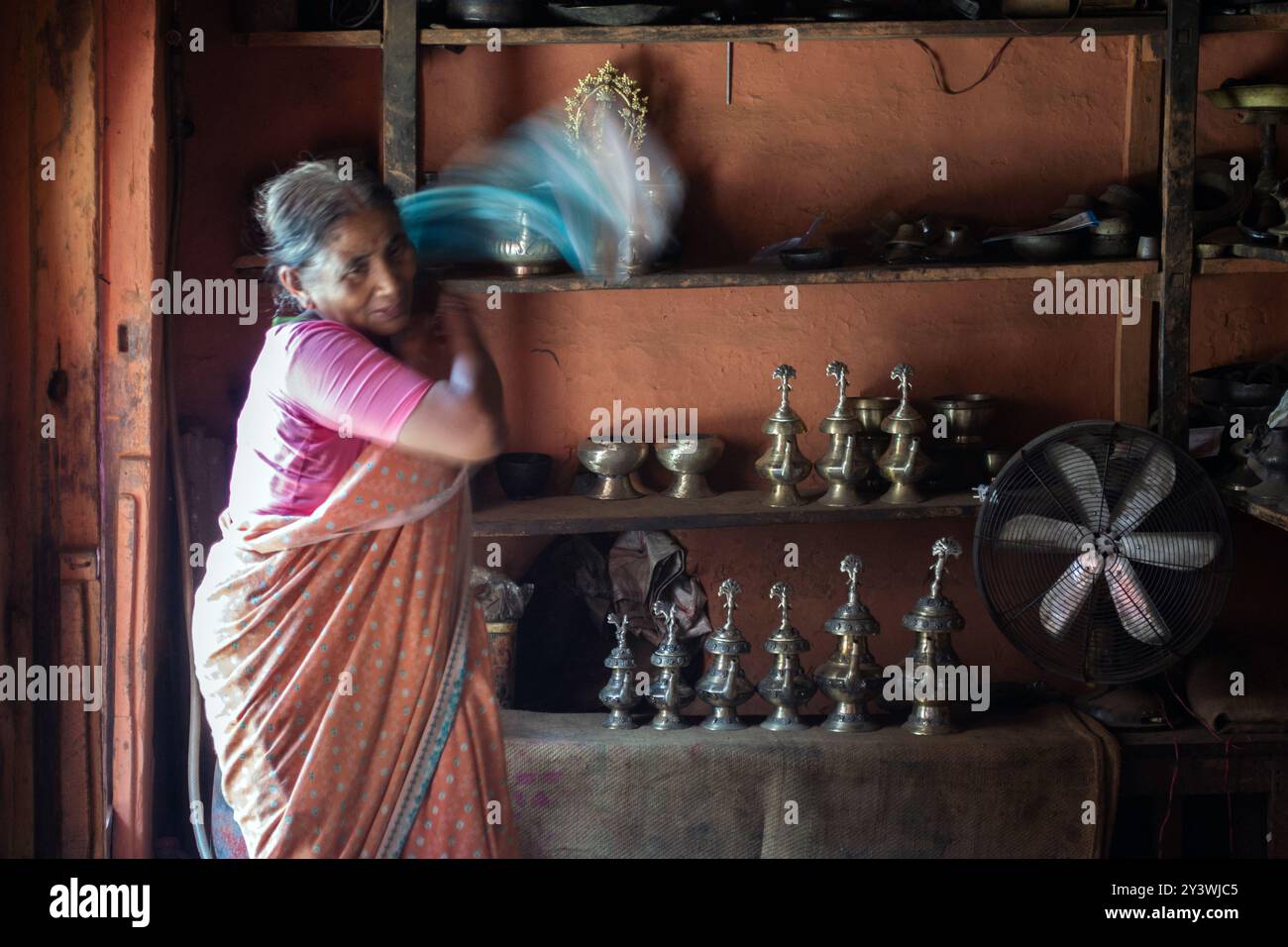 Tansen, Nepal. Elderly woman throws sari over her shoulder Stock Photo ...