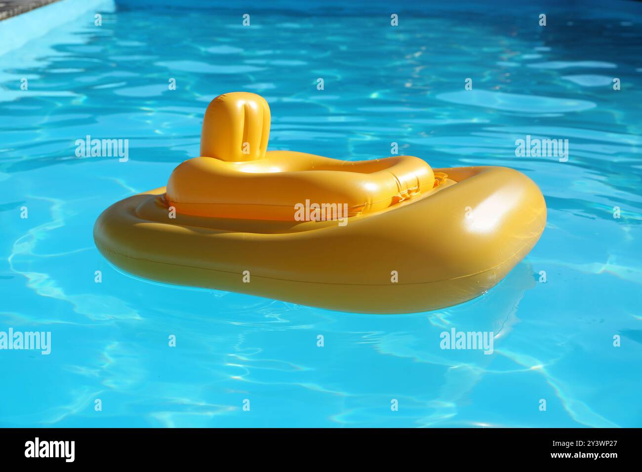 Yellow float in swimming pool at luxury resort Stock Photo - Alamy