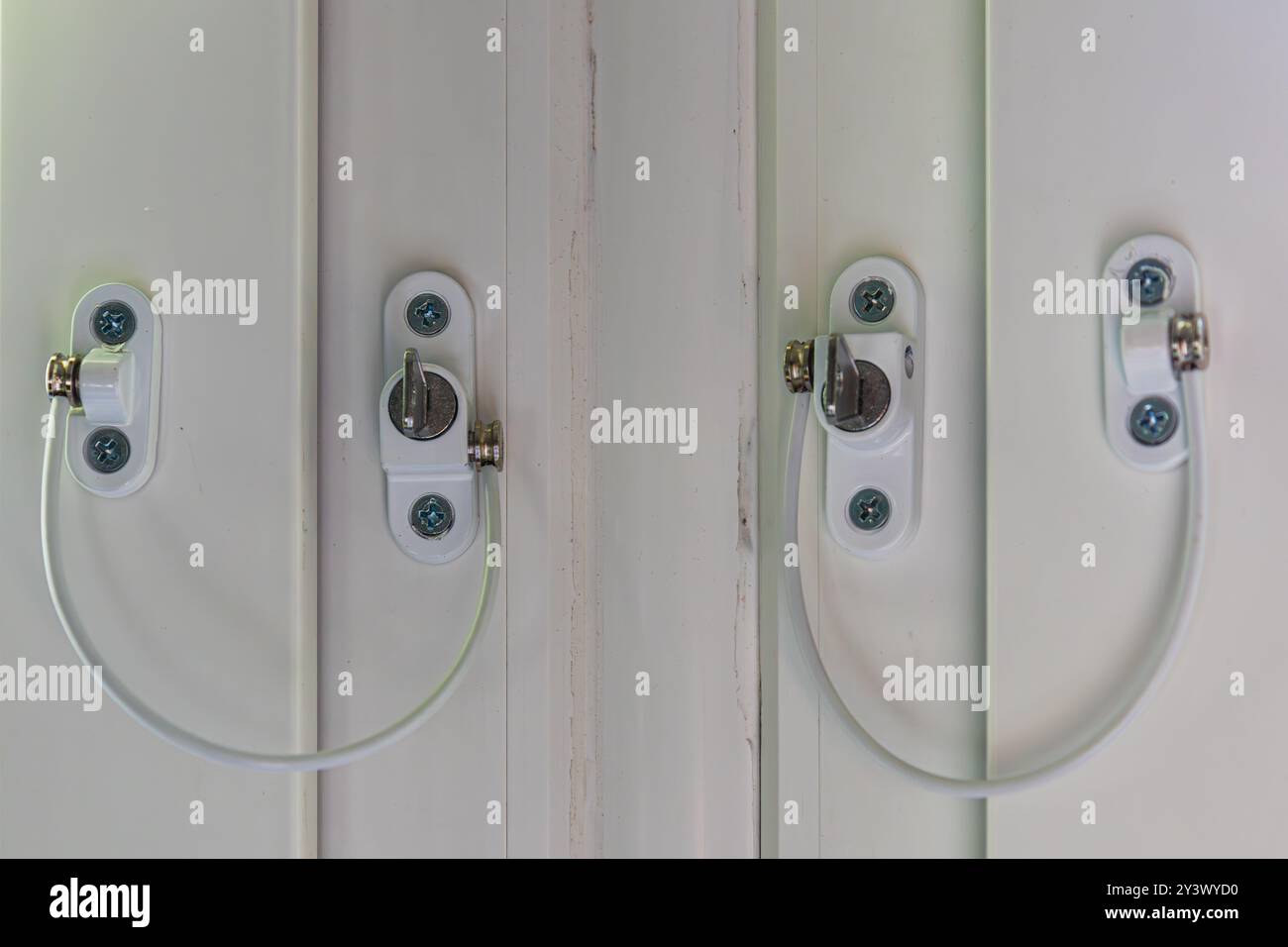 Bolted locks on the windows for the safe stay of children in the house ...