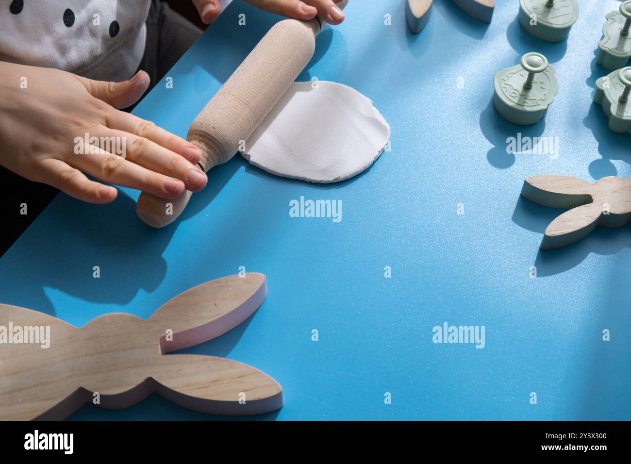 Unrecognizable artist do it yourself air dry clay crafts for Easter ...