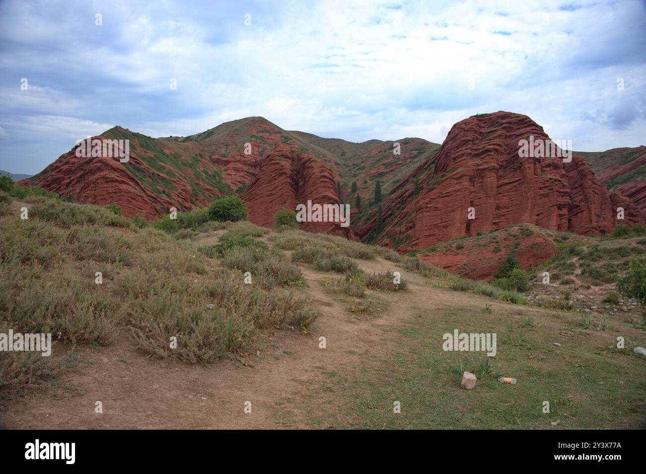 Scenic red rocks mountains in Kyrgyzstan Stock Photo - Alamy
