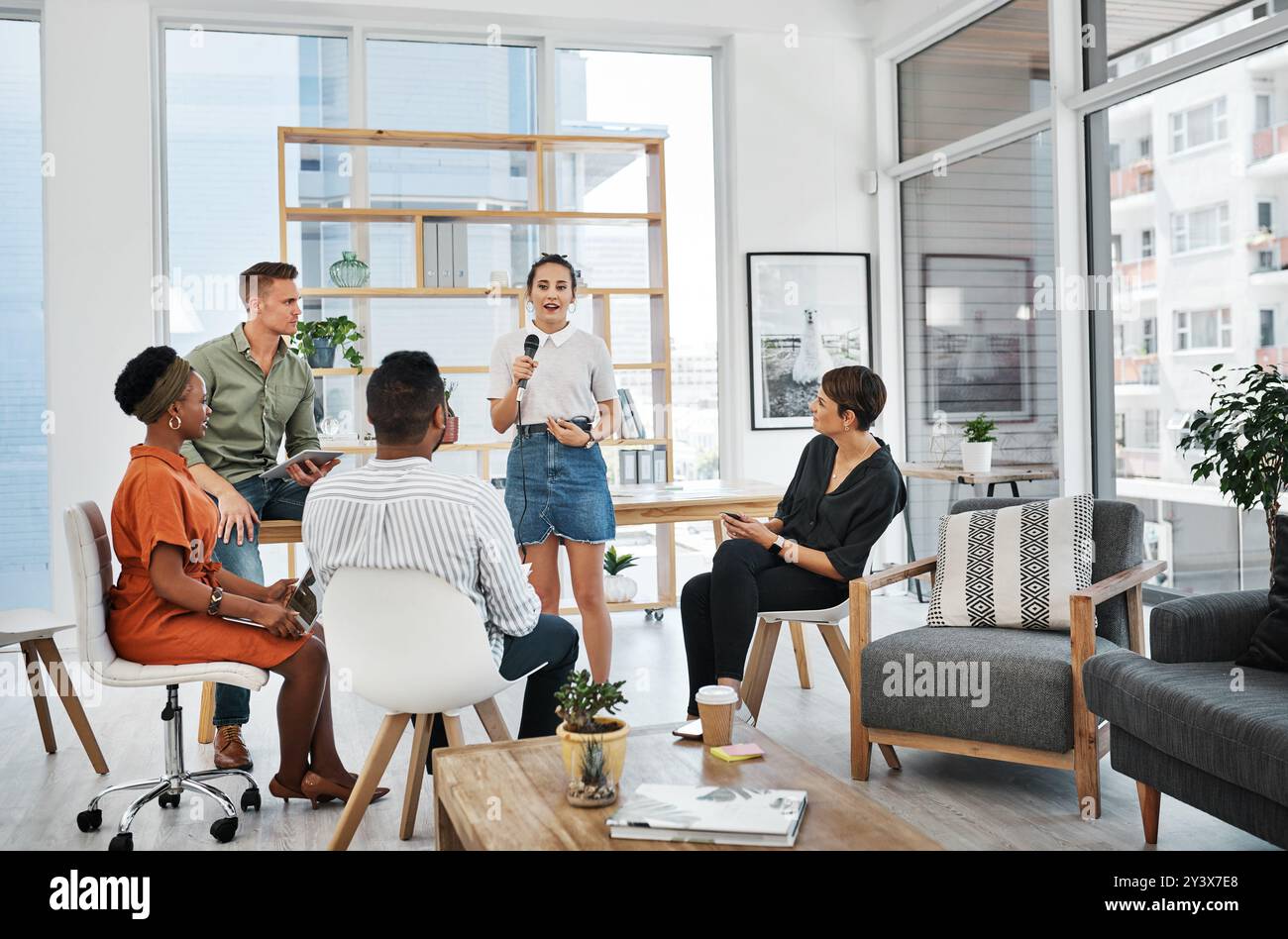 Business, woman and seminar with mic in office for corporate coaching ...