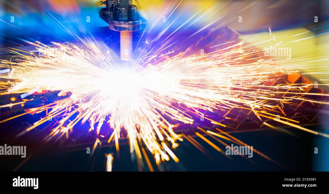 Laser cutting of metal with sparks Stock Photo - Alamy