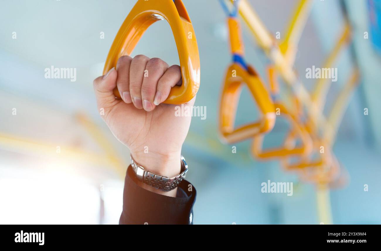 People standing on busy commuter bus hi-res stock photography and ...