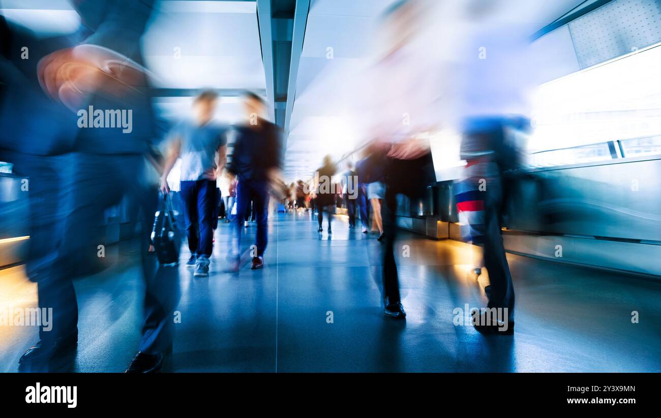 Business people rushing in the lobby Stock Photo - Alamy