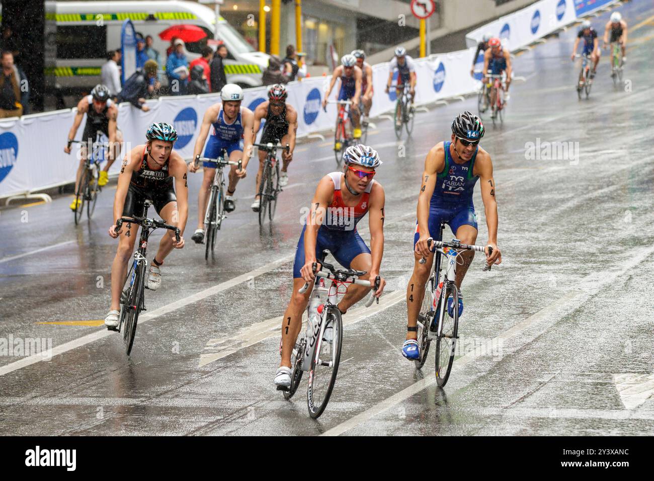 Triathletes compete in the cycle leg of the Elite Men's Race of the ...