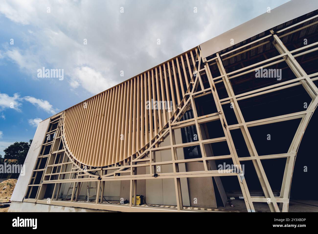 A structure featuring wooden slats on construction site contributing to ...