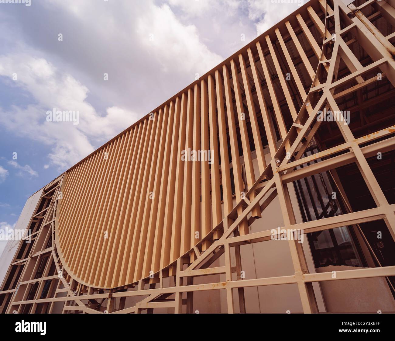 A structure featuring wooden slats on construction site contributing to ...