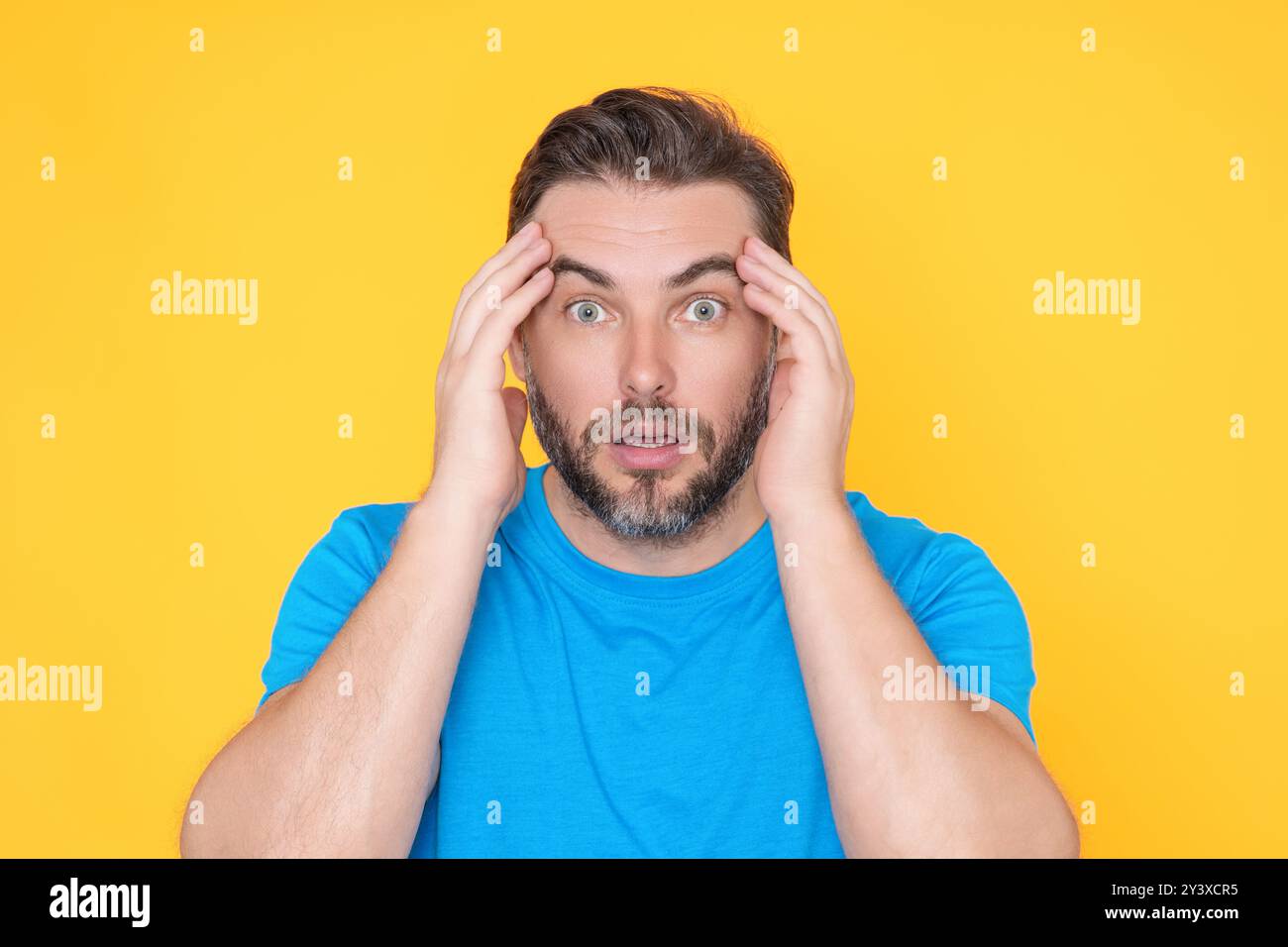 Portrait of surprised man. Wow, it's unbelievable. Shocked man opening ...