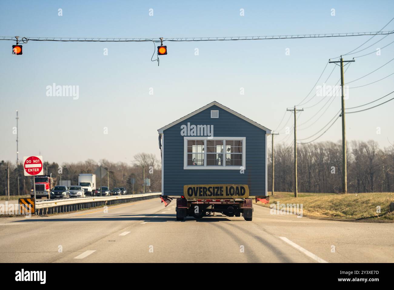 Oversize load. Manufactured house transported on the highway. Mobile ...