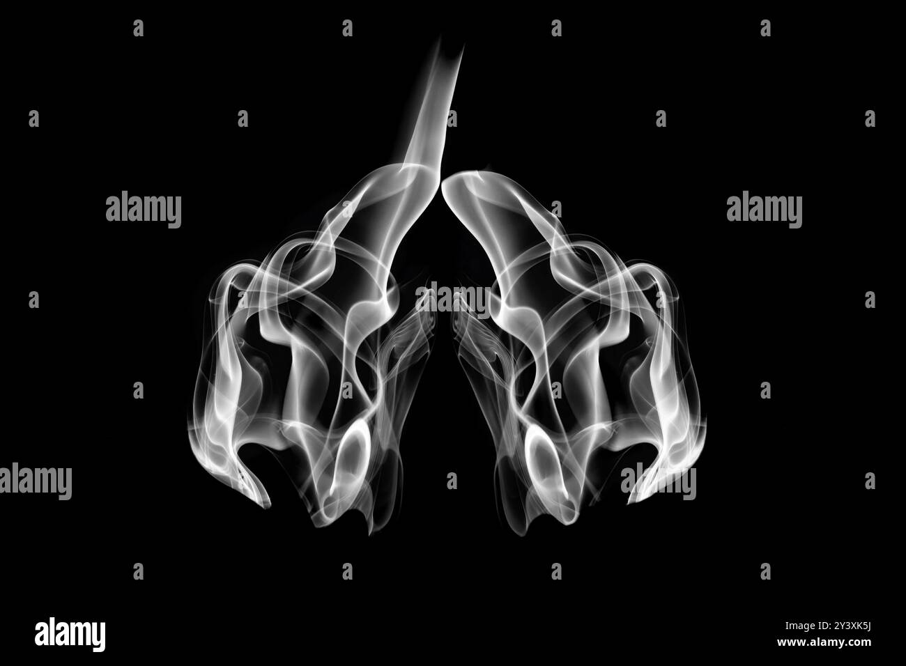 White smoke formation resembling lungs against a black background ...