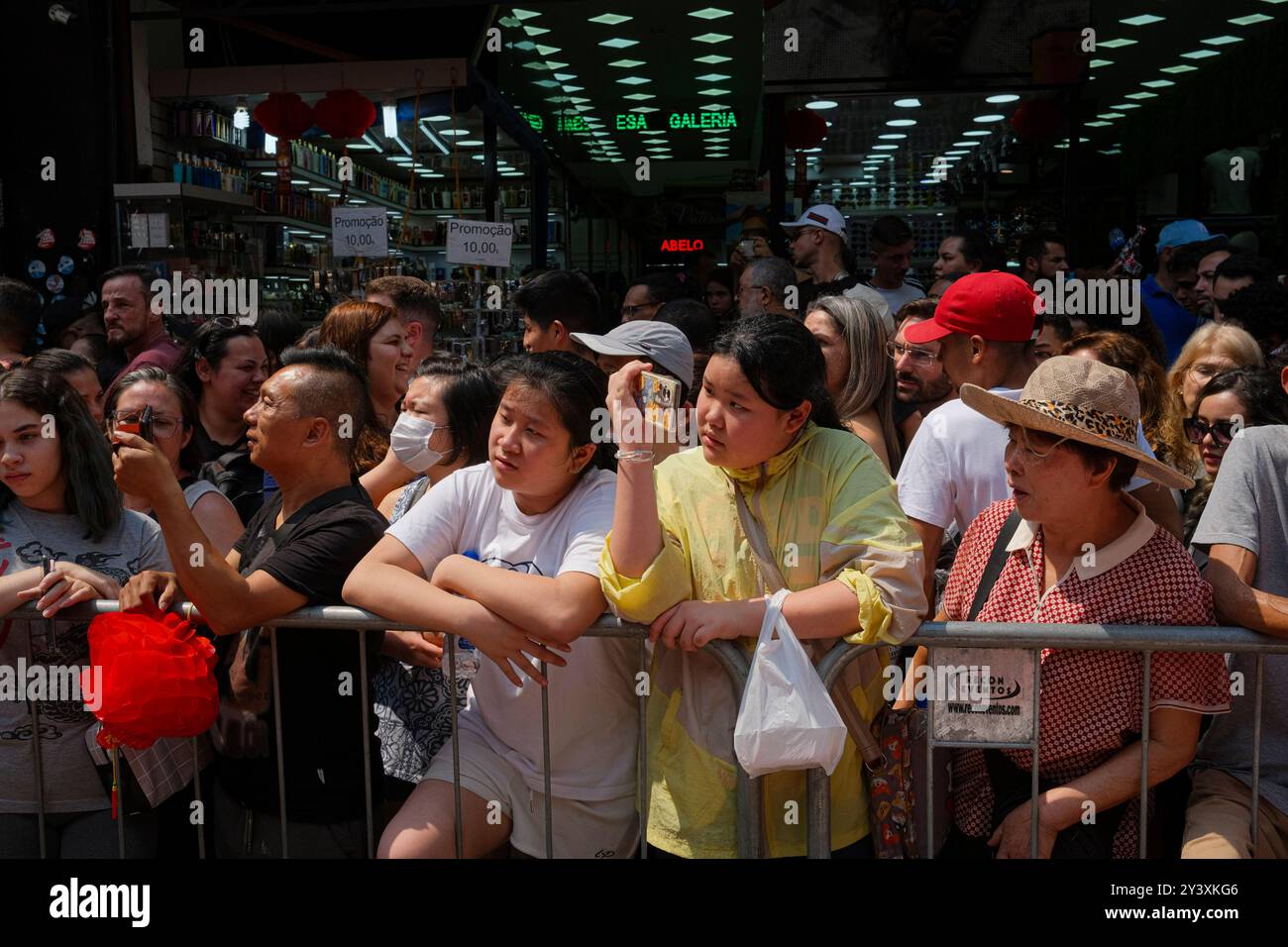 Members of the Chinese community in Sao Paulo, Brazil, gather in the ...