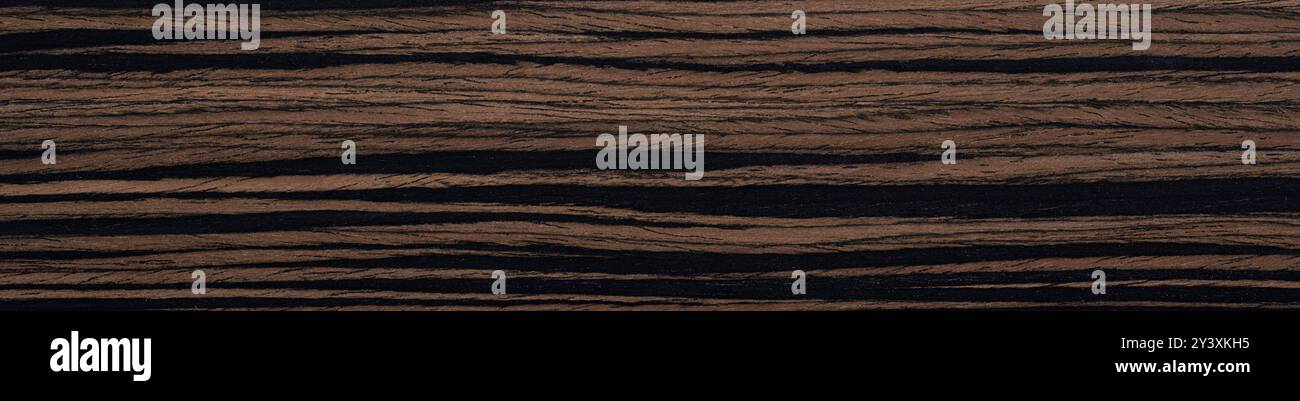 Elegant ebony wood with rich dark brown hues and striking black streaks Stock Photo - Alamy