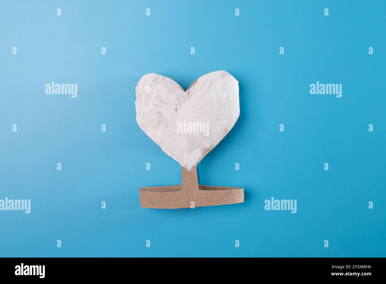 white heart paper craft on blue background, top view, recycle, play ...