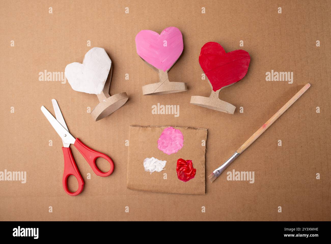 three hearts sitting next to each other, top view, folk art, close-up, paper craft, recycle ...