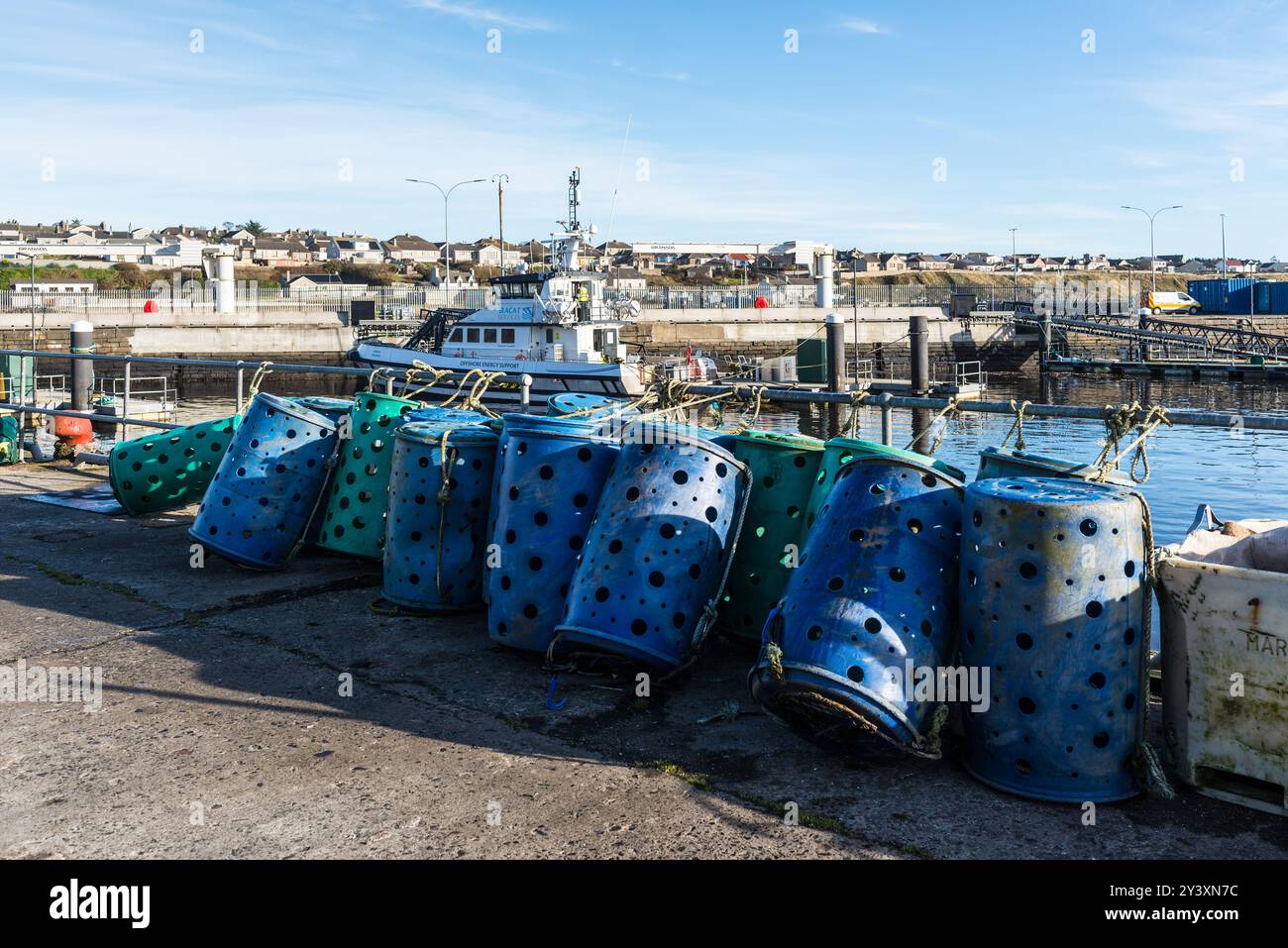 Wick, Scotland, UK - October 23, 2023: Plastic whelk pots on a ...
