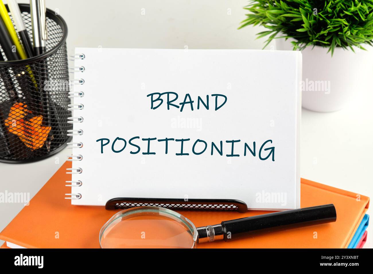 Economic concept. The inscription BRAND POSITIONING handwritten text in ...