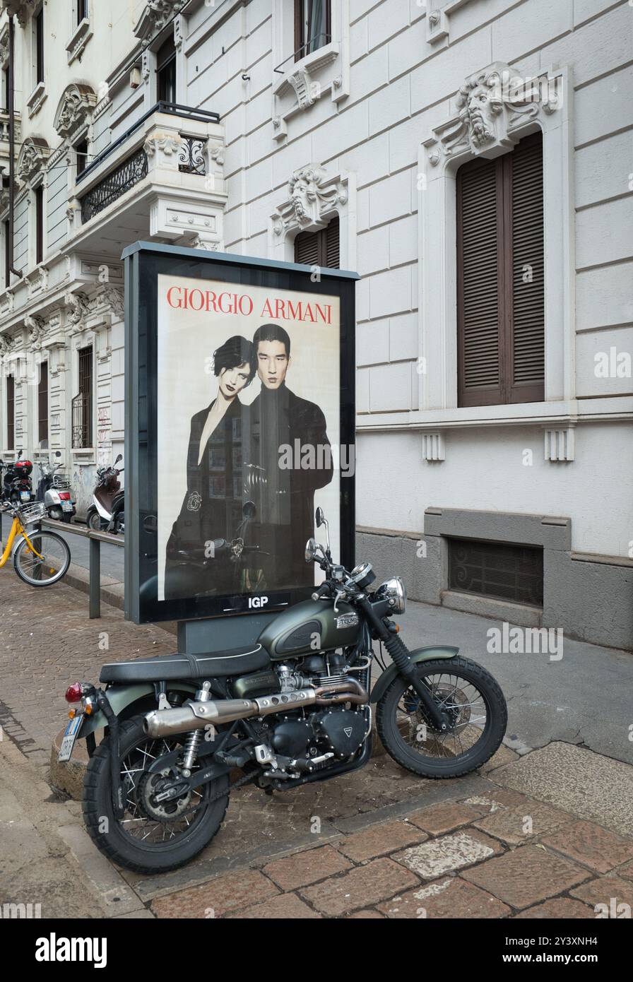 Milano, Italy, fall 2024, Giorgio Armani advertising billboard in a street of the city center ...