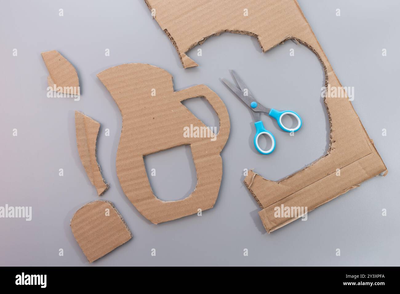 making process of summer craft from recycled paper, cut out cardboard ...