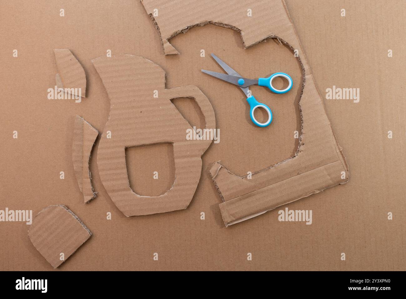 making process of summer craft from recycled paper, cut out cardboard ...