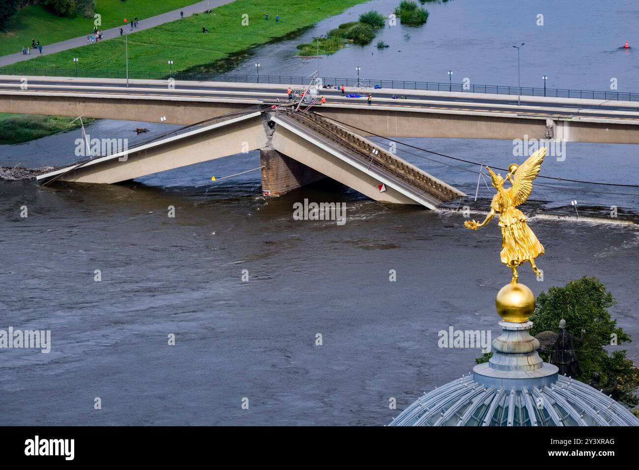 Aerial view of the golden Statue of an angel looking down on the river ...