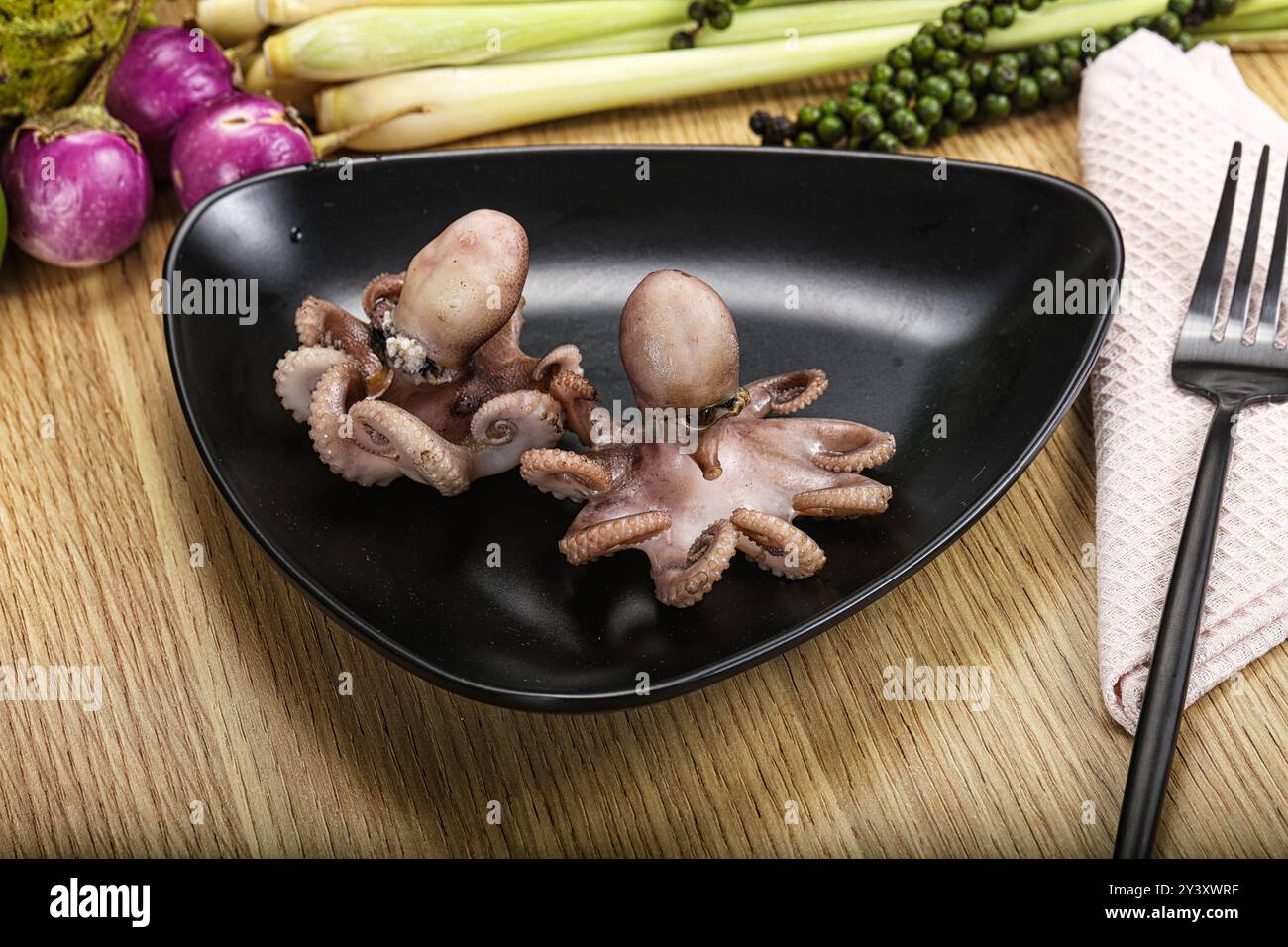 Delicous luxury seafood - boiled octopus in the plate Stock Photo - Alamy