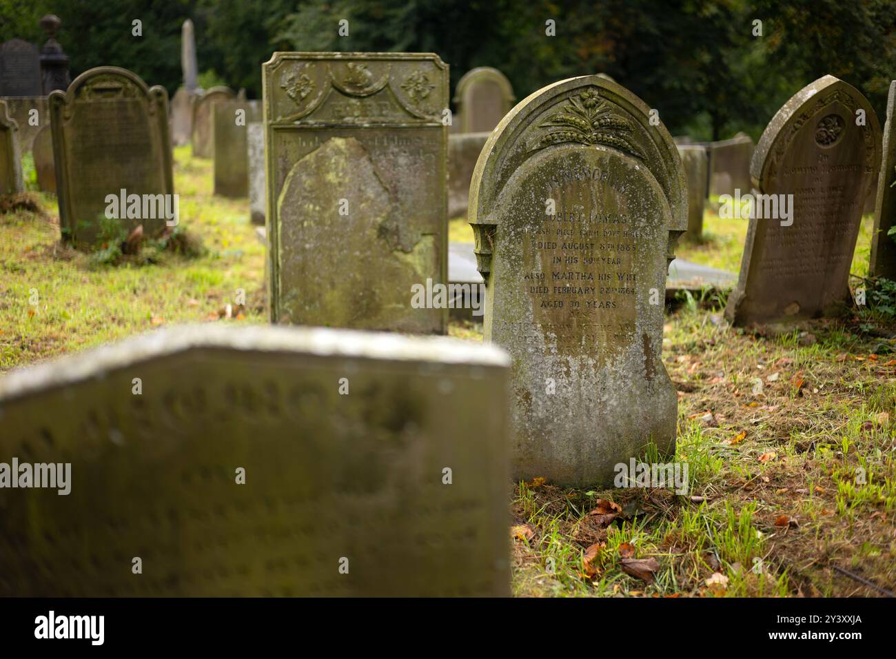 Old gravestones in the churchyard in Chapel-en-le-Frith, Peak District ...
