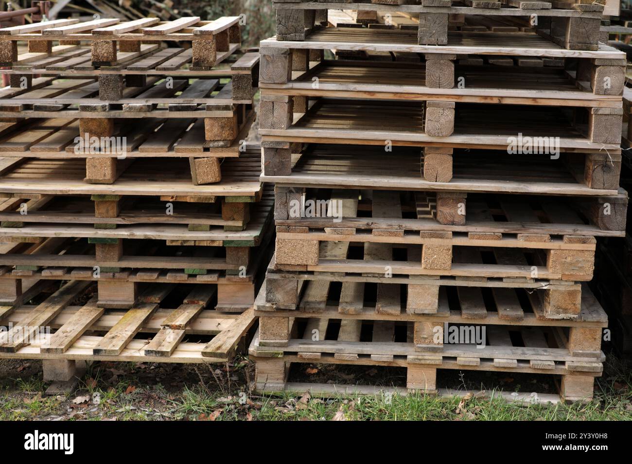 Wooden pallets Pallets stacked up Stock Photo - Alamy