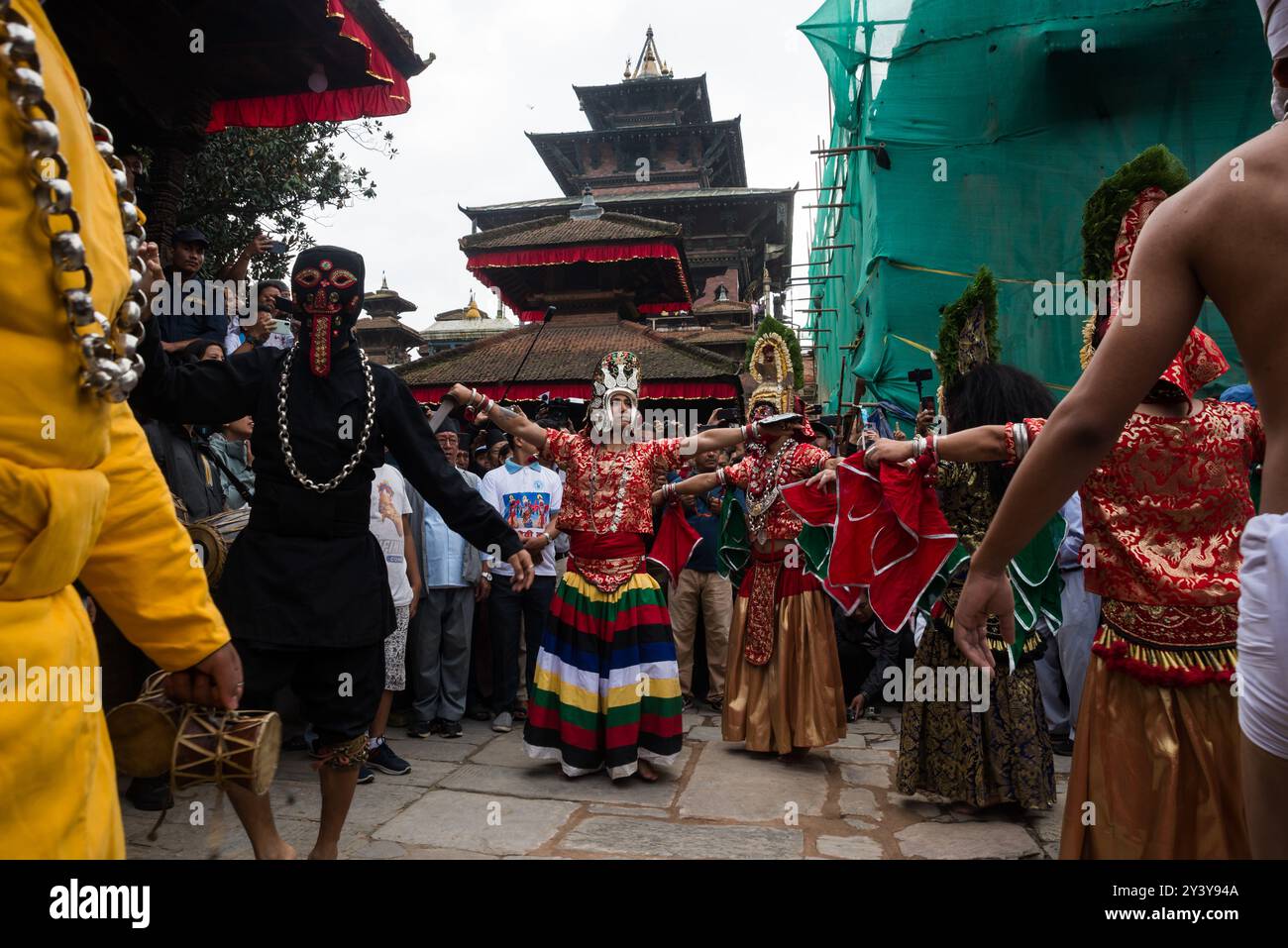Kathmandu, Nepal. 15th Sep, 2024. Devotees dressed in costumes and mask ...
