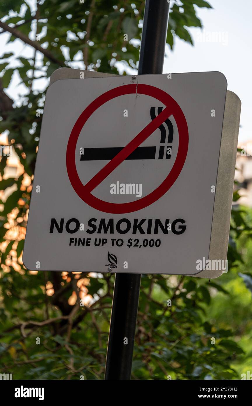 A pedestrian Smoke-Free park in Singapore. Smoking is prohibited at ...